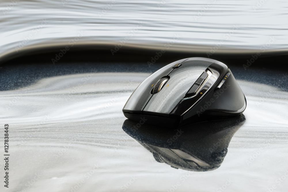 Light painting of High technology computer gaming mouse fast moving in ...