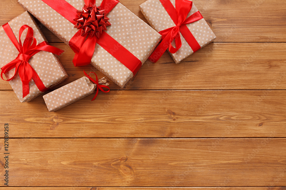 Presents in gift boxes on wood frame background Stock Photo | Adobe Stock