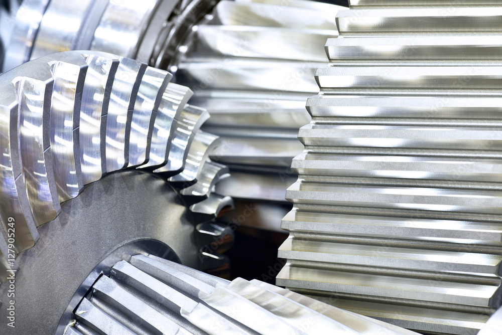 Zahnräder in einem Getriebe // gear wheels in a gearbox Stock Photo ...