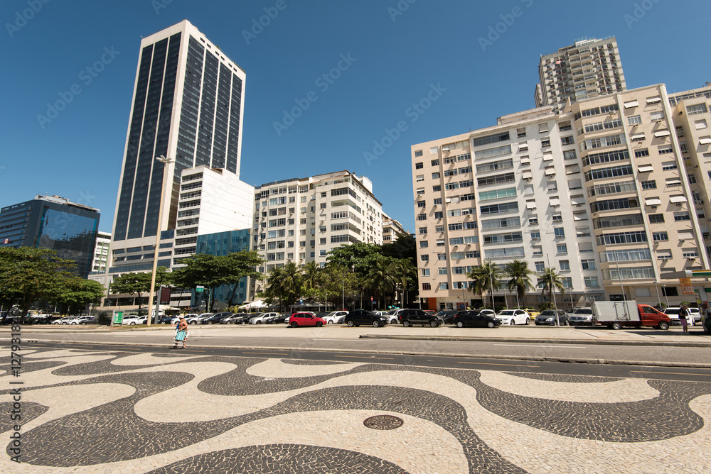 Famous Mosaic Sidewalk of Copacabana with Hotel and Apartment Buildings ...