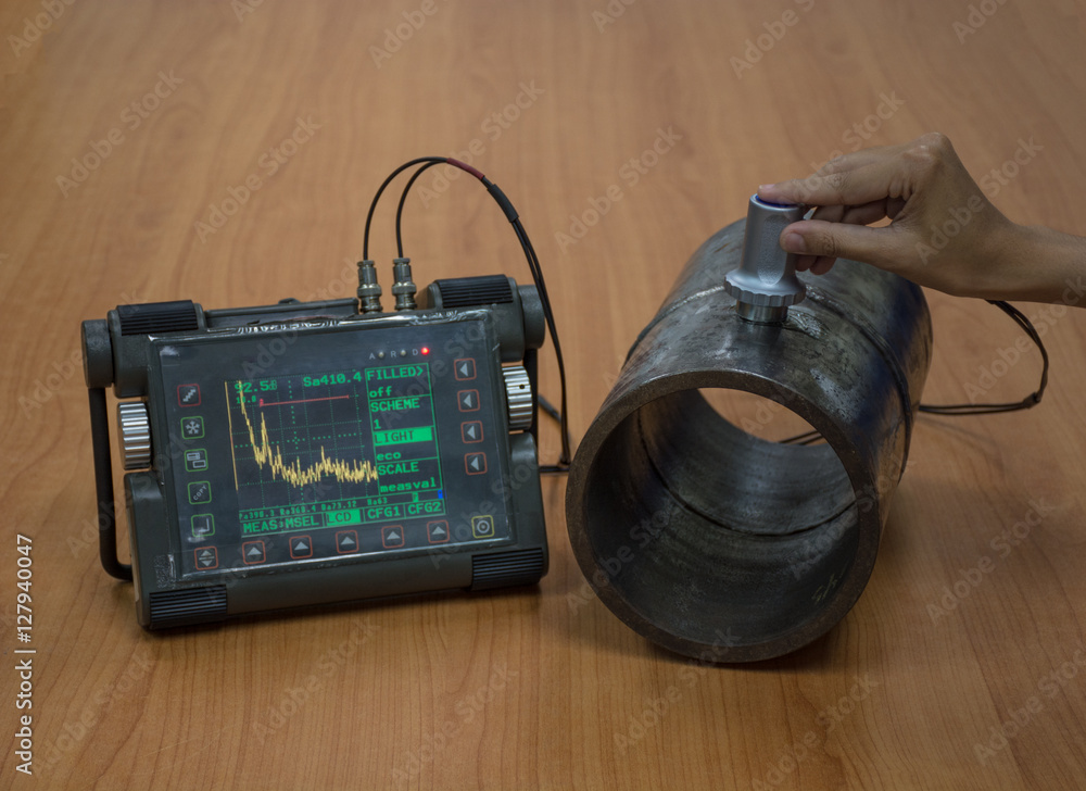 Steel pipe inspection by ultrasonic test for found internal defe Stock ...