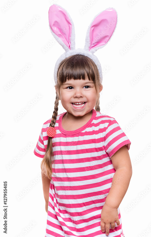 Foto Stock Happy little girl with pink rabbit ears. Portrait of cute ...
