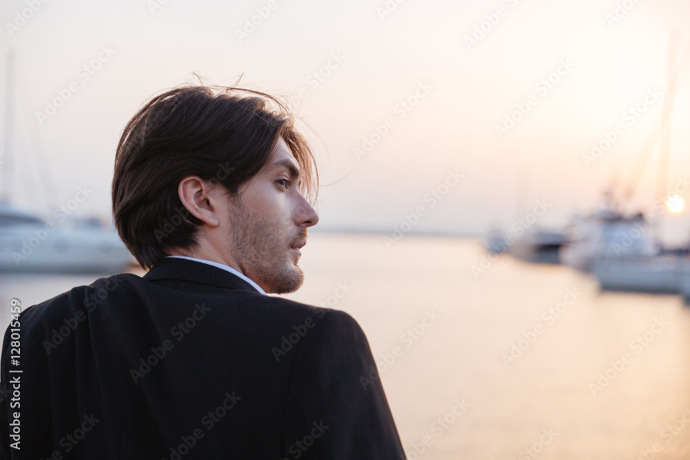 Man in suit from behind Stock Photo | Adobe Stock