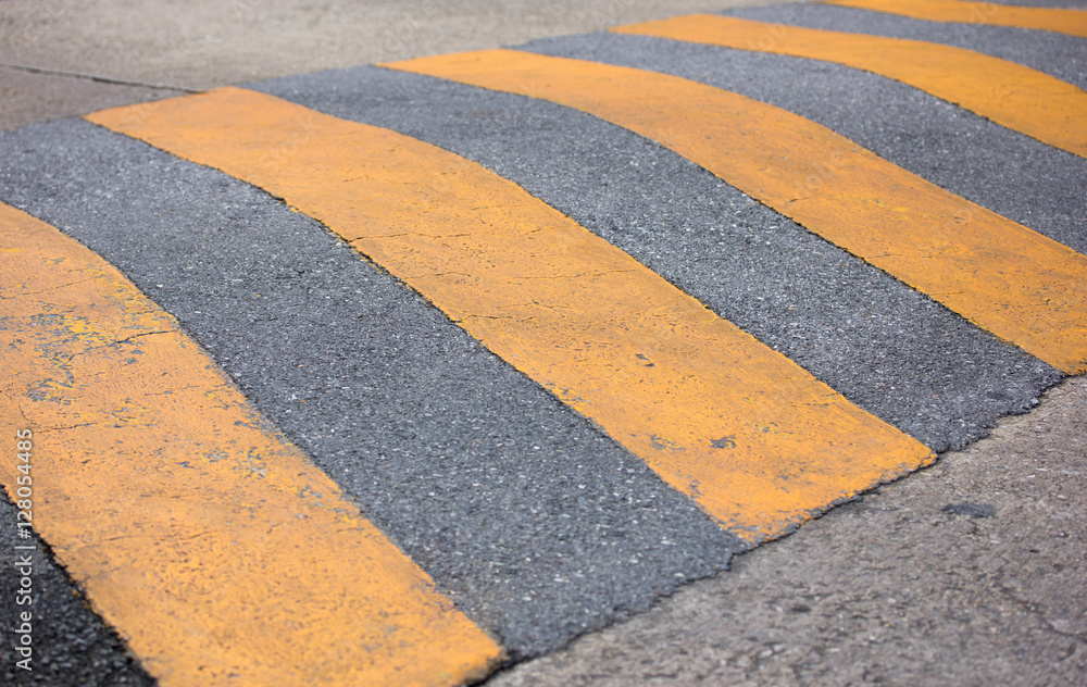 traffic safety speed bump on the road Stock Photo | Adobe Stock