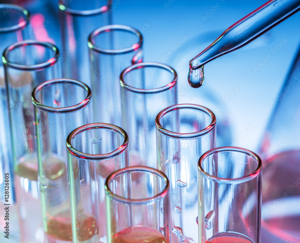 Different laboratory beakers and glassware. Stock Photo | Adobe Stock