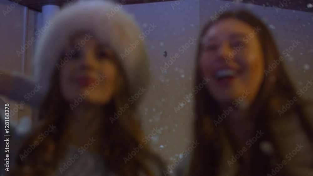 Two cheerful cute teenage girls hugging, one girl kissing her best ...