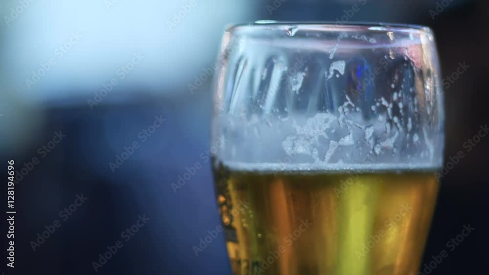 Beer Glass in a Pub. Close up of beer glass with blur background stock ...