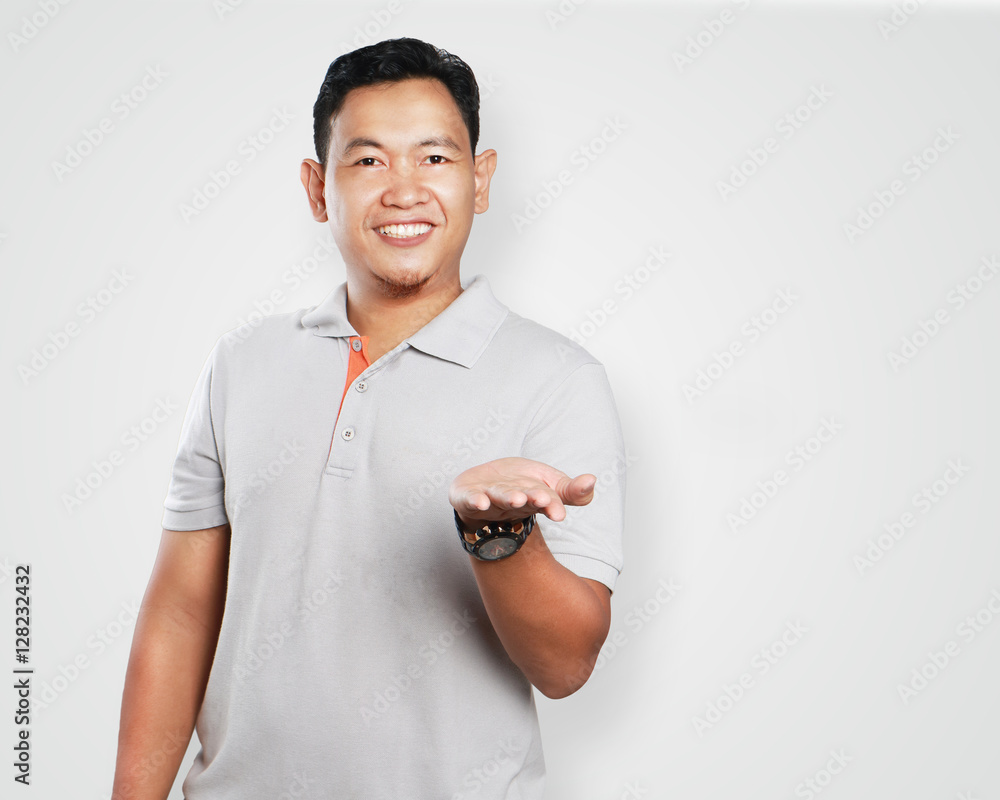 Funny Young Asian Guy Showing His Left Palm Open Stock Photo | Adobe Stock