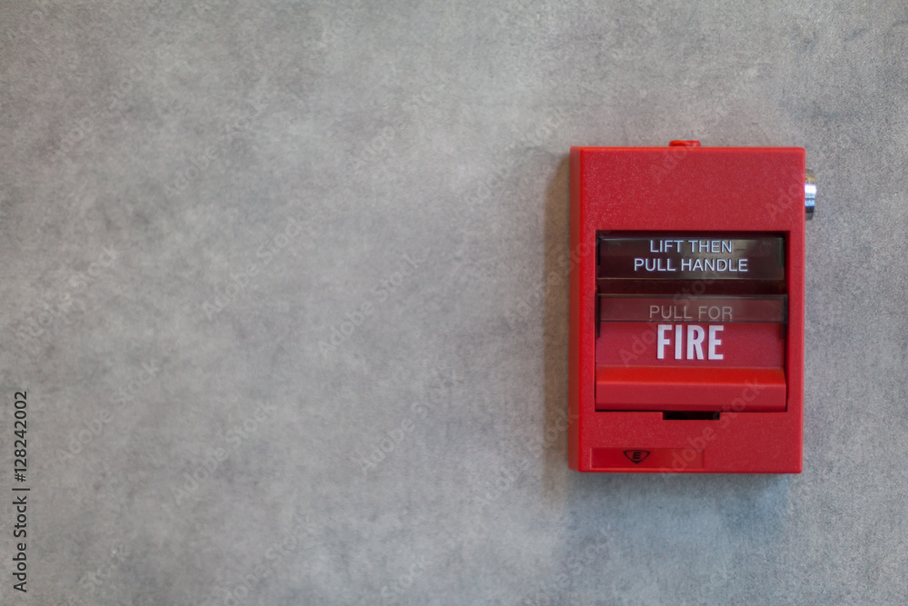 Fire Alarm. Red fire alarm system on grey wall Stock Photo | Adobe Stock
