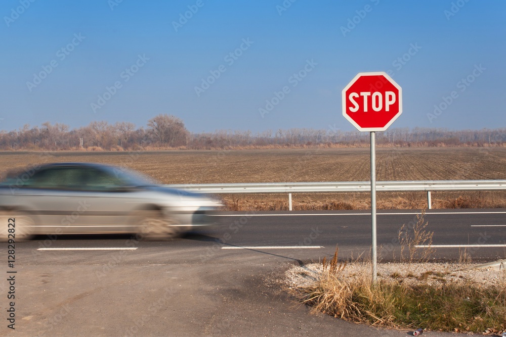 Stop Sign at Crossroads. Roads in the Slovak countryside. Exit onto the ...