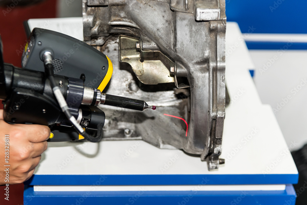 inspection automotive part dimension by 3D scan measuring machine Stock ...