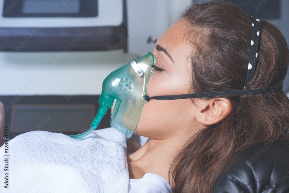 Woman Wearing Oxygen Mask