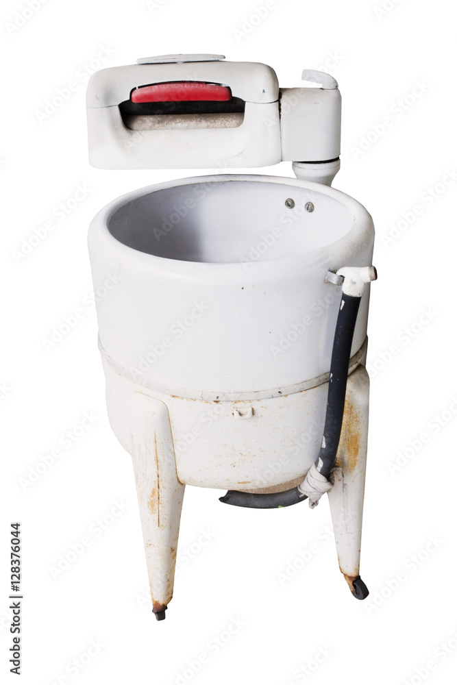 Isolated rusting old-fashioned washing machine with wringer. Vertical ...