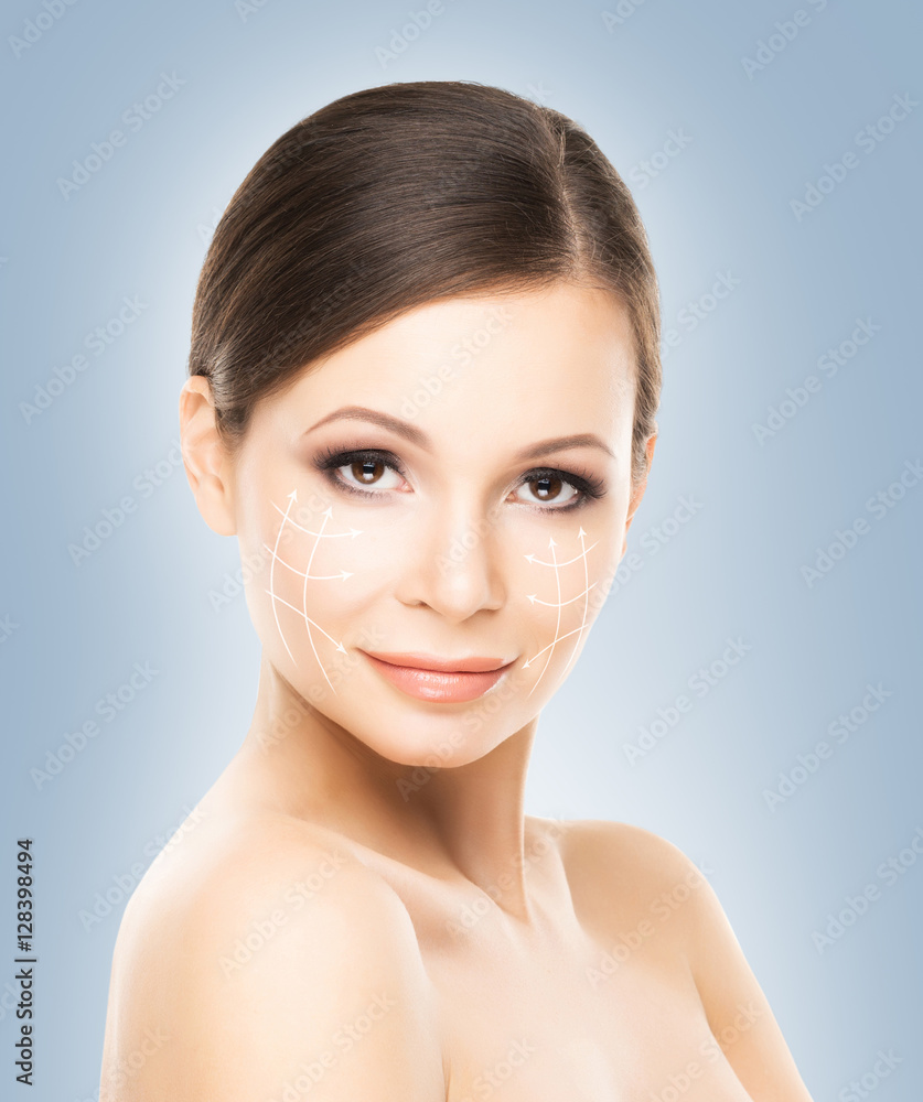 Portrait of a young woman with arrows on her face Stock Photo | Adobe Stock