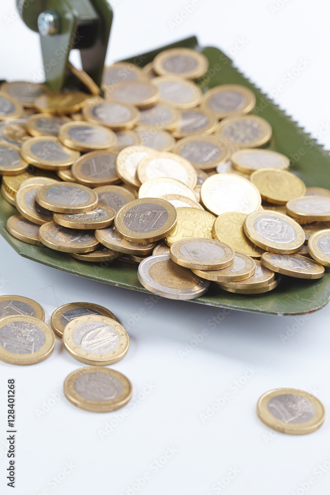 shovel with money Stock Photo | Adobe Stock