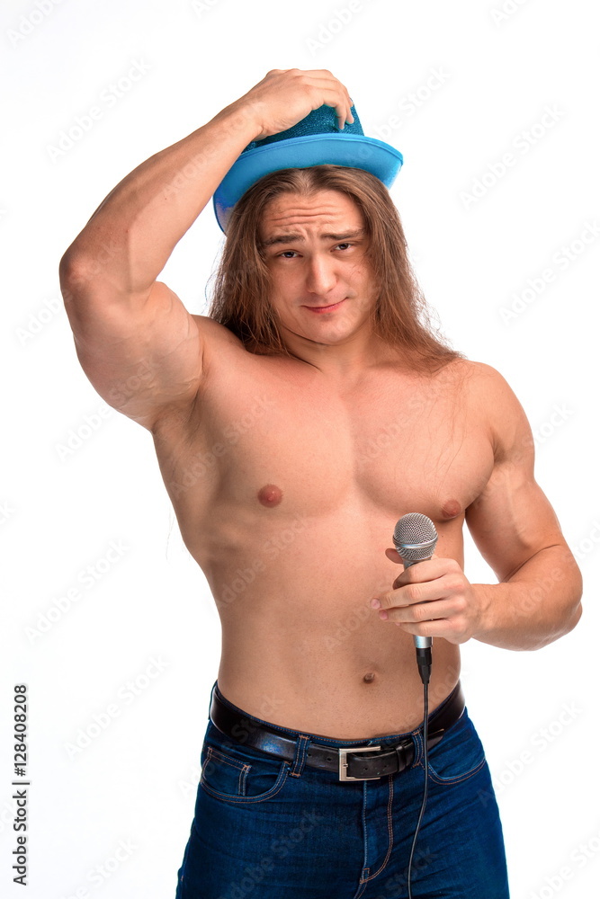 singer bodybuilder shirtless with long hair in a blue hat with a ...