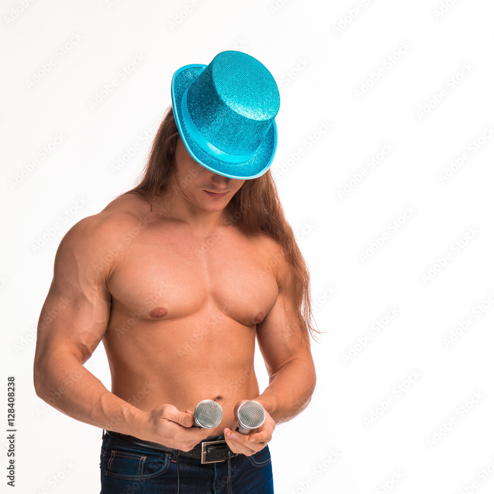singer bodybuilder shirtless with long hair in a blue hat with a ...