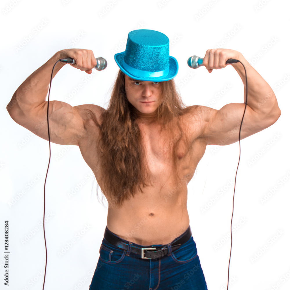 singer bodybuilder shirtless with long hair in a blue hat with a ...