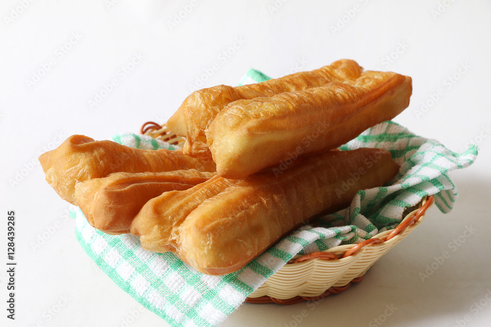 Chinese traditional food, deep fried bread stick normally eaten with ...