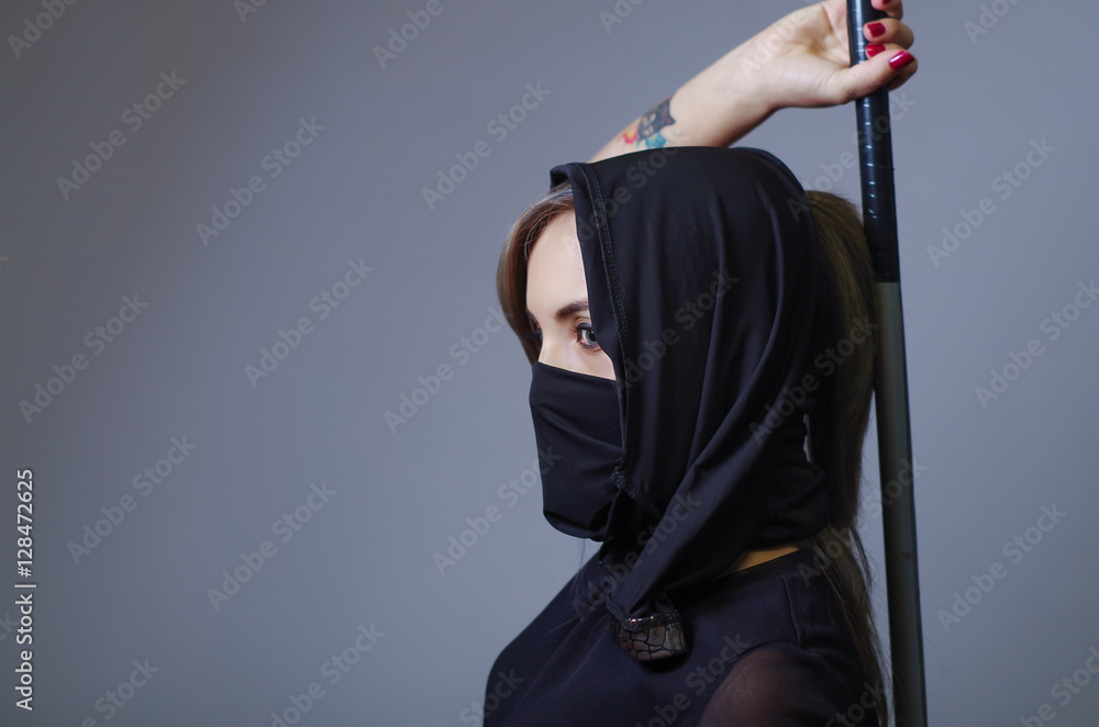 Samurai woman dressed in black with matching veil covering face ...