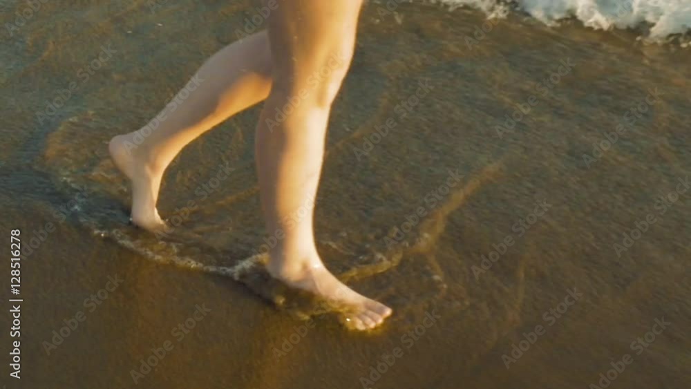 Walking alongside the waves at the beach. Best angle to take pictures ...