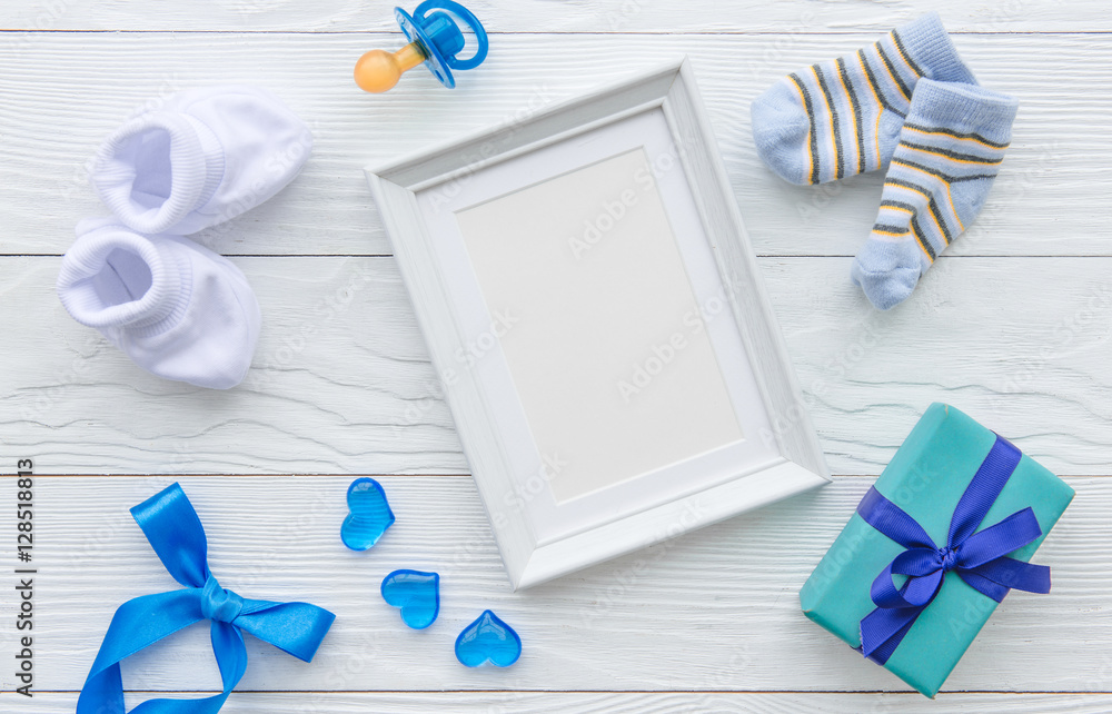 birth of child - blank picture frame on wooden background Stock Photo ...