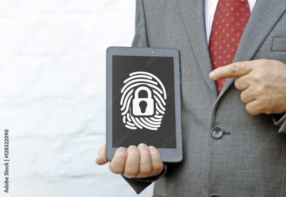 Businessman pointing tablet computer with fingerprint lock button ...