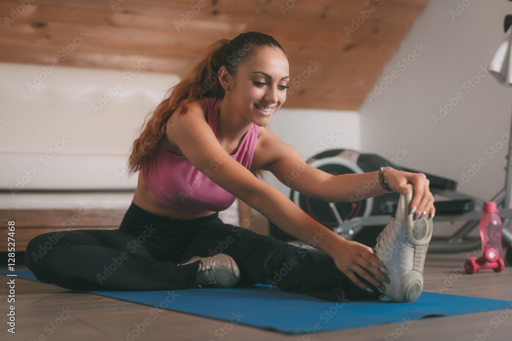 Girl Doing Stretching Exercises Stock Photo | Adobe Stock