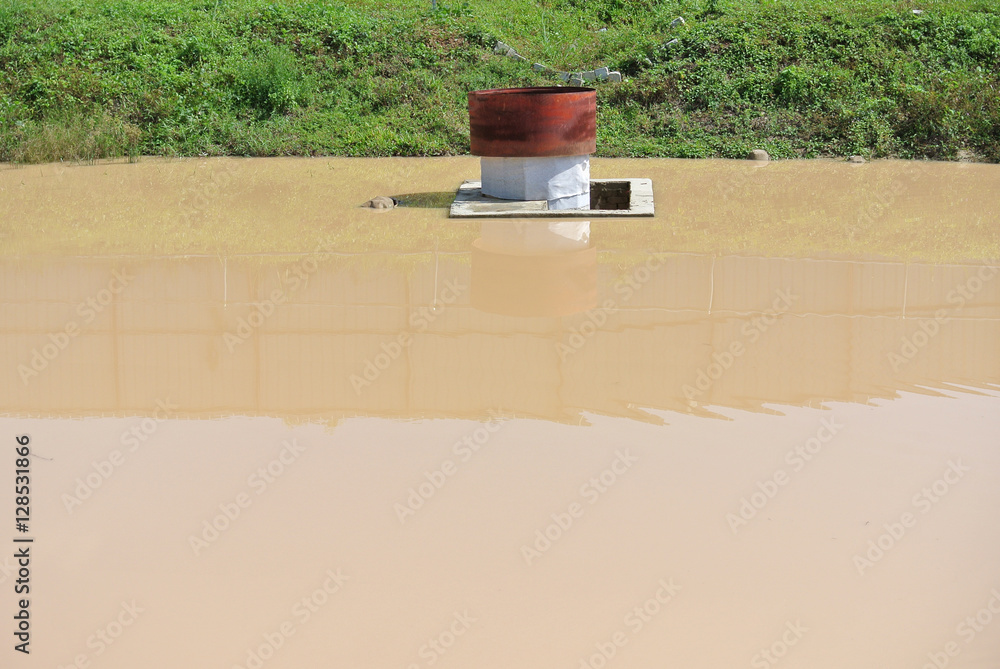 Sediment pond, where soil and mud from the construction site in ...