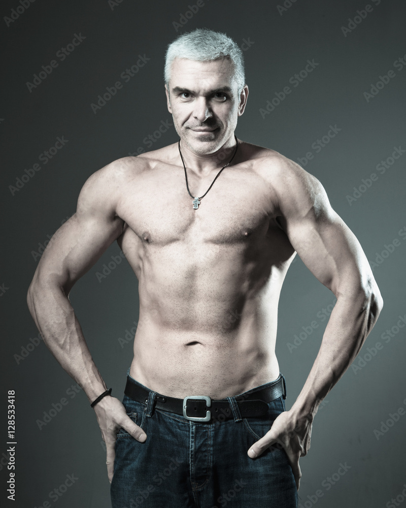 Strong man with perfect abs, shoulders, biceps, triceps and ches Stock ...