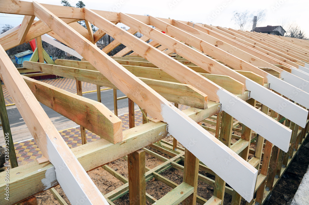 The wooden structure of the building. Wooden frame building. Wooden ...