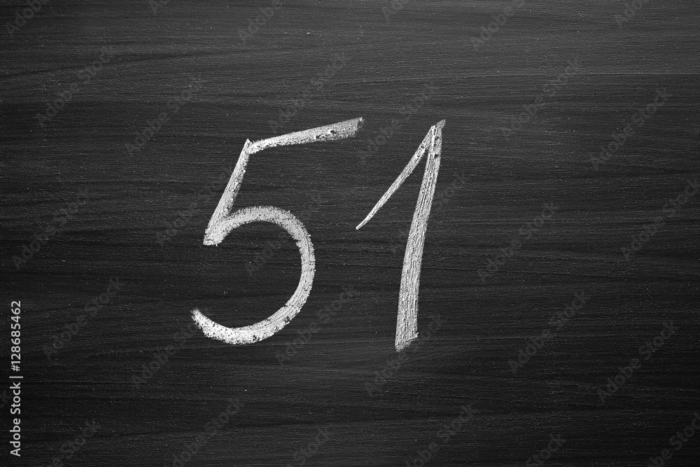 number fifty one enumeration written with a chalk on the blackboard ...