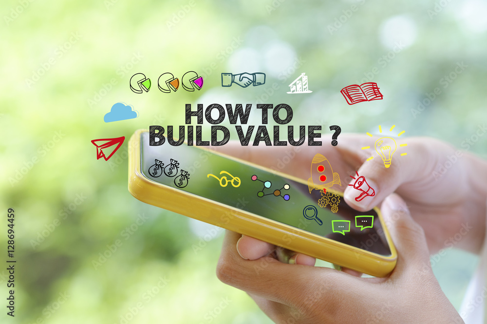 how to build value over a smart phone on blur background , busin Stock ...