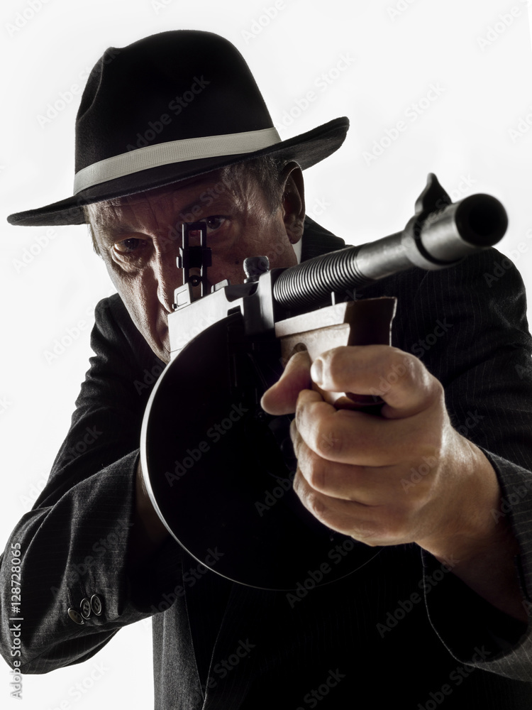 Old style gangster with tommy gun, on white background Stock Photo ...