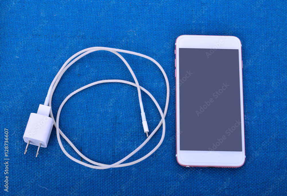 Mobile phone with connected plug of charger, smartphone charging Stock ...