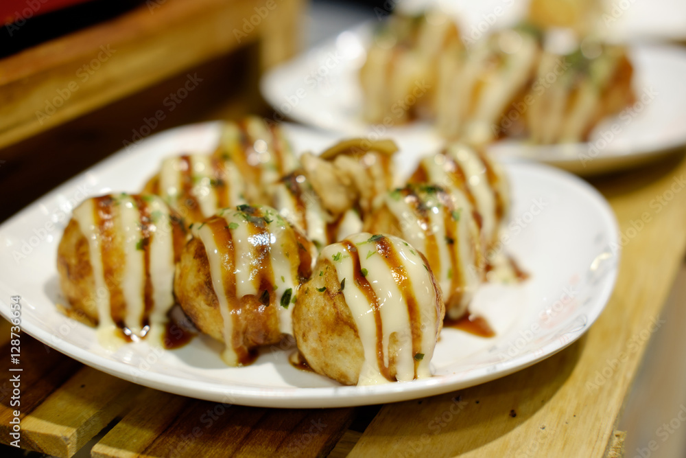 Takoyaki Japanese food,i ball shaped Japanese snack made of a wheat ...