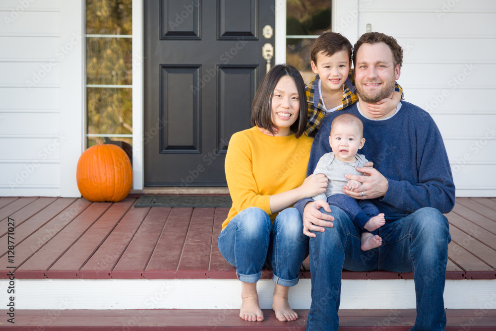 Young Mixed Race Chinese and Caucasian Family Portrait On Their Front ...