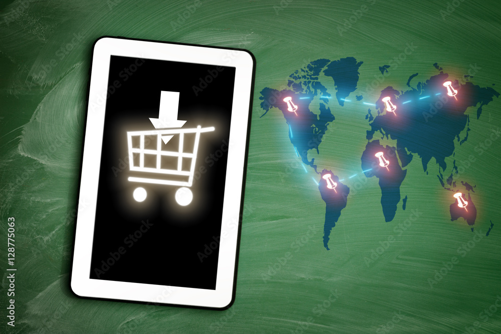 Online shopping cart on tablet and pins around world map on chal Stock ...