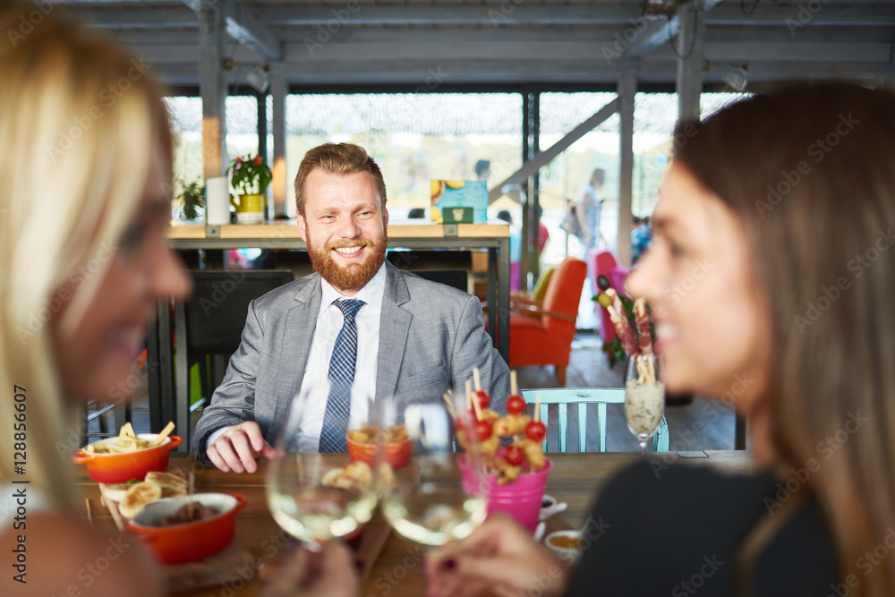 business people meeting in modern restaurant, colleagues having dinner ...