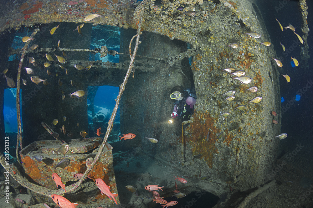 Wreck Diver with Reflection inside the SS Thistlegorm shipwreck near ...