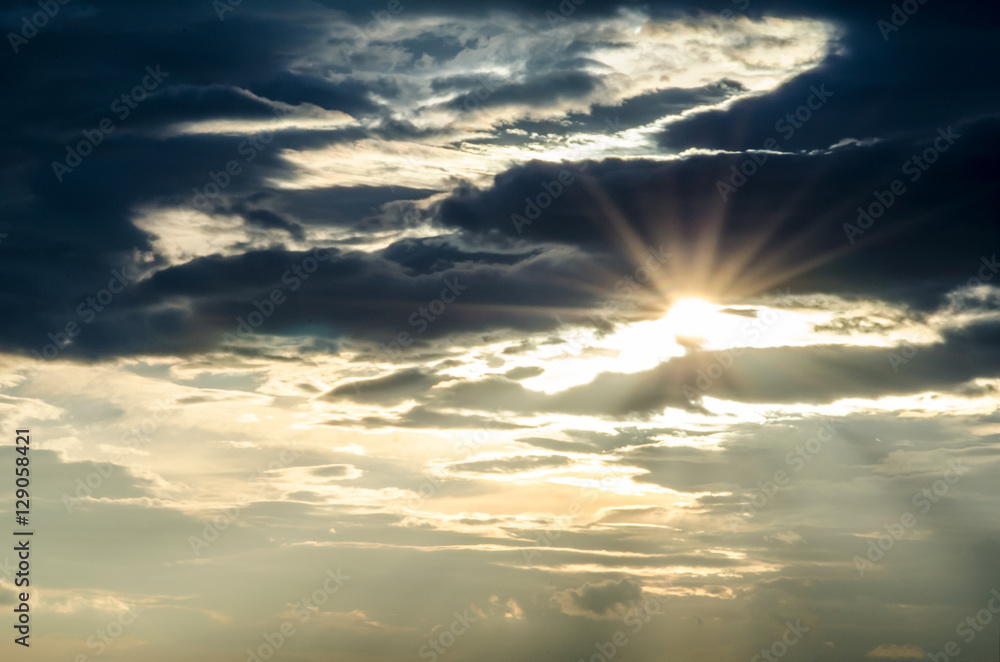 Dark storm sky with sun rays Stock Photo | Adobe Stock