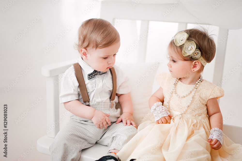 two babies wedding - boy and girl dressed as bride and groom Stock ...