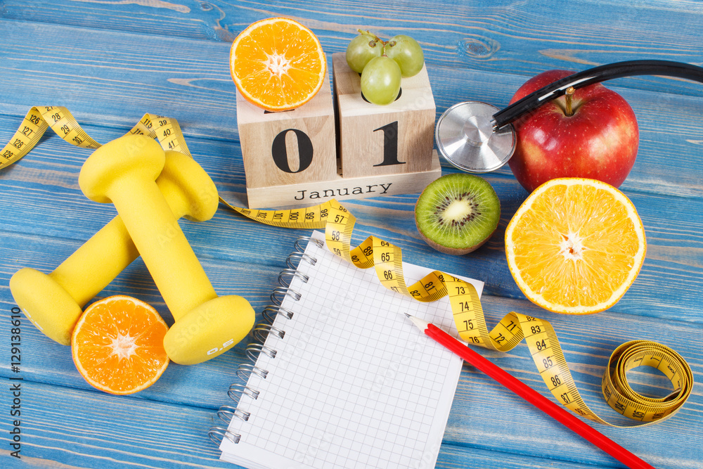 Cube calendar, fruits, dumbbells and tape measure, new years ...