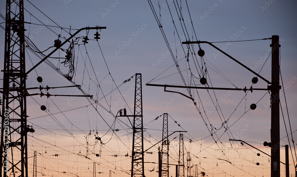 Railroad overhead lines against clear blue sky, Contact wire. High ...