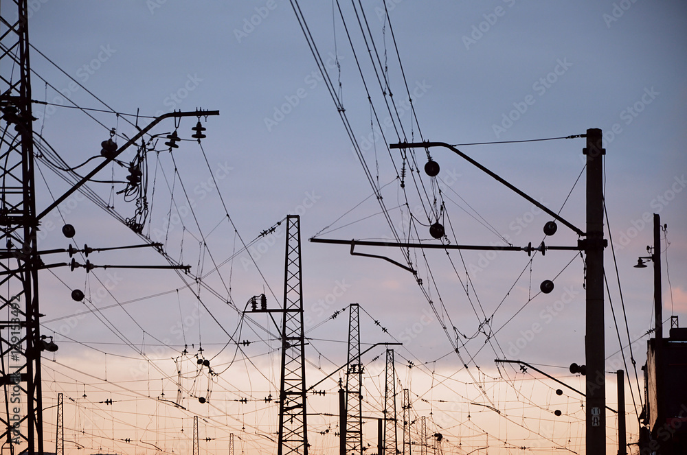 Railroad overhead lines against clear blue sky, Contact wire. High ...