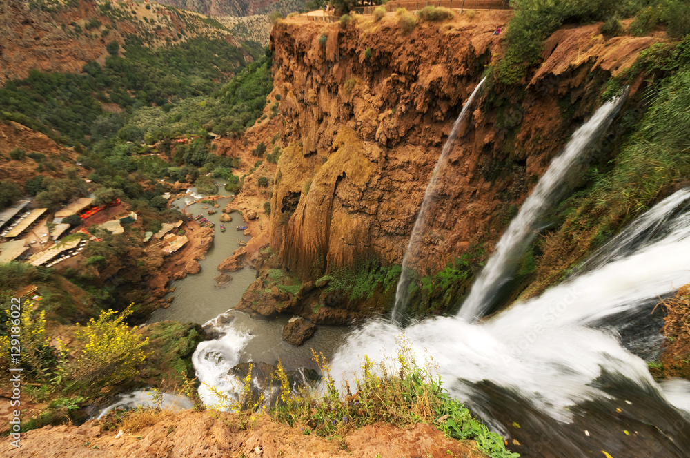 Ouzoud Waterfalls located in the Grand Atlas village of Tanaghmeilt, in ...