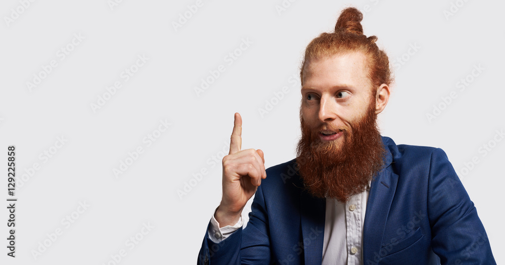Funny man in blue suit have perfect idea. Crazy businessman show finger ...
