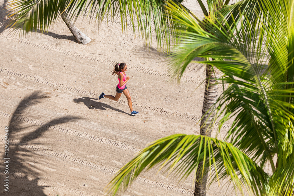 Fitness athlete running training cardio on beach. Woman jogging in ...