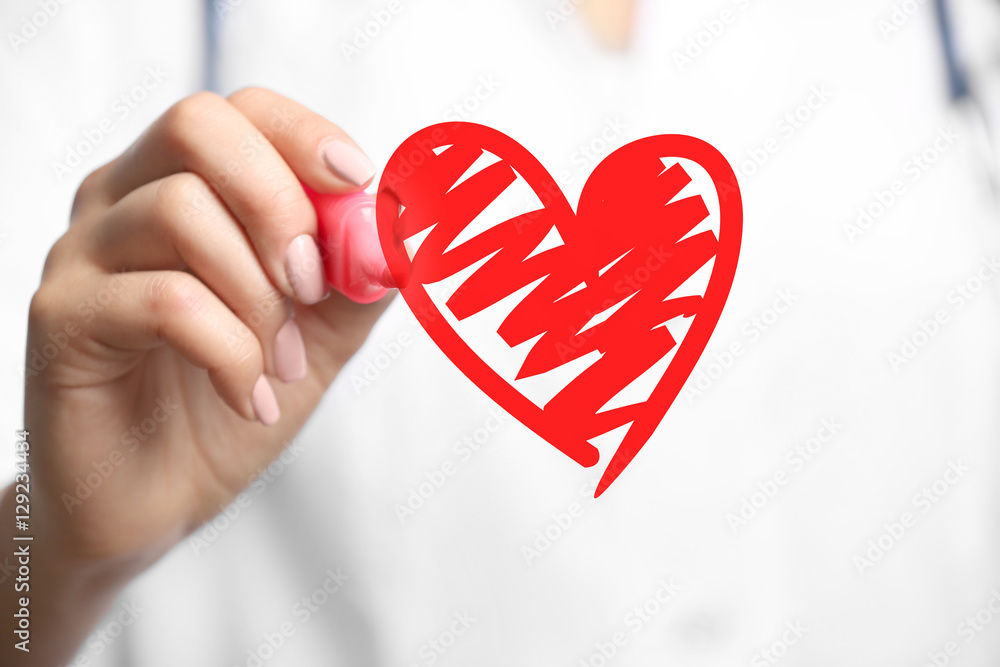 Cardiologist drawing heart, closeup. Cardiology concept. Stock Photo ...