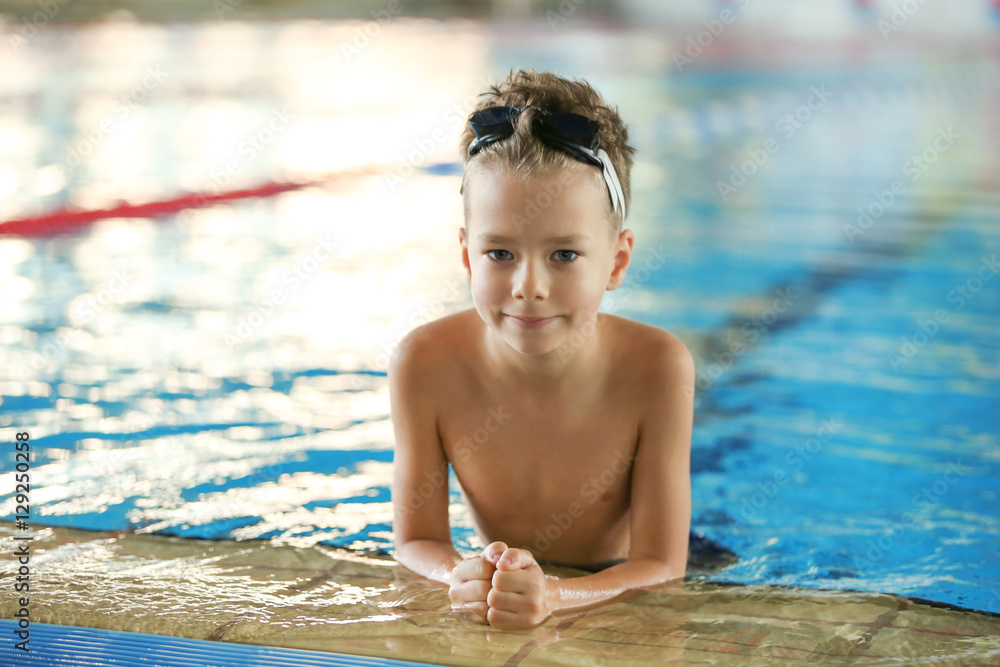 Cute boy in the sport swimming pool Stock Photo | Adobe Stock